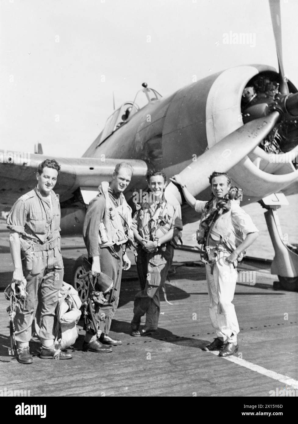In March 1945, four pilots of a Hellcat fighter squadron on HMS Empress ...
