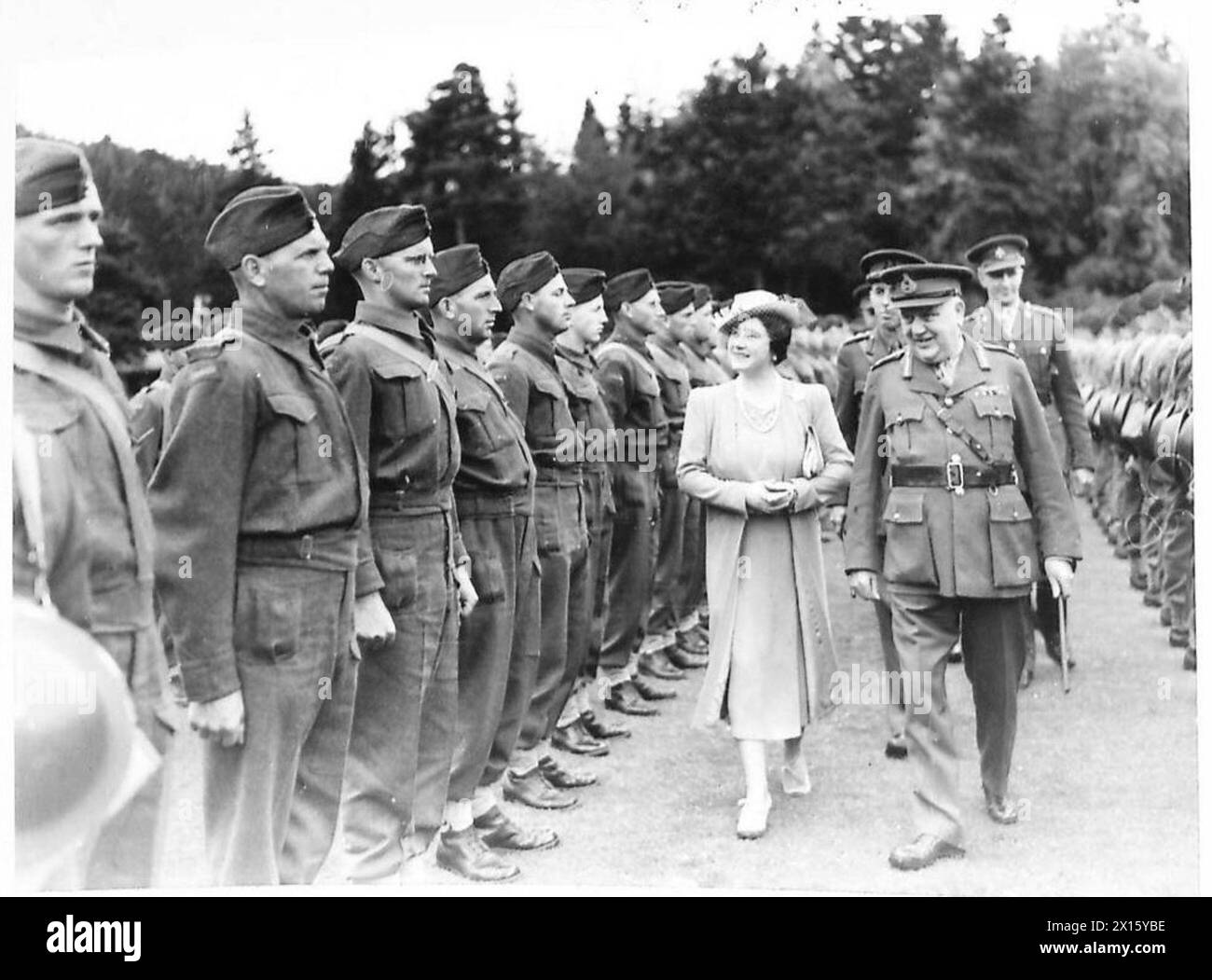 The King and Queen inspect personnel of the Canadian Forestry Corps ...