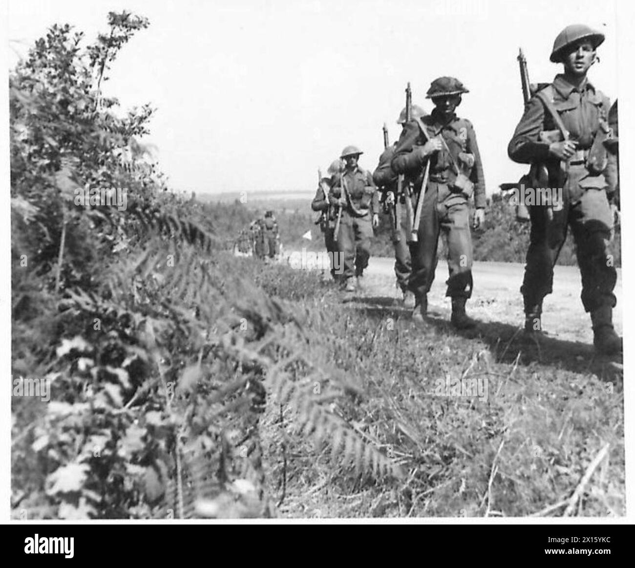 British infantry from the Durham Light Infantry and tanks advance south ...