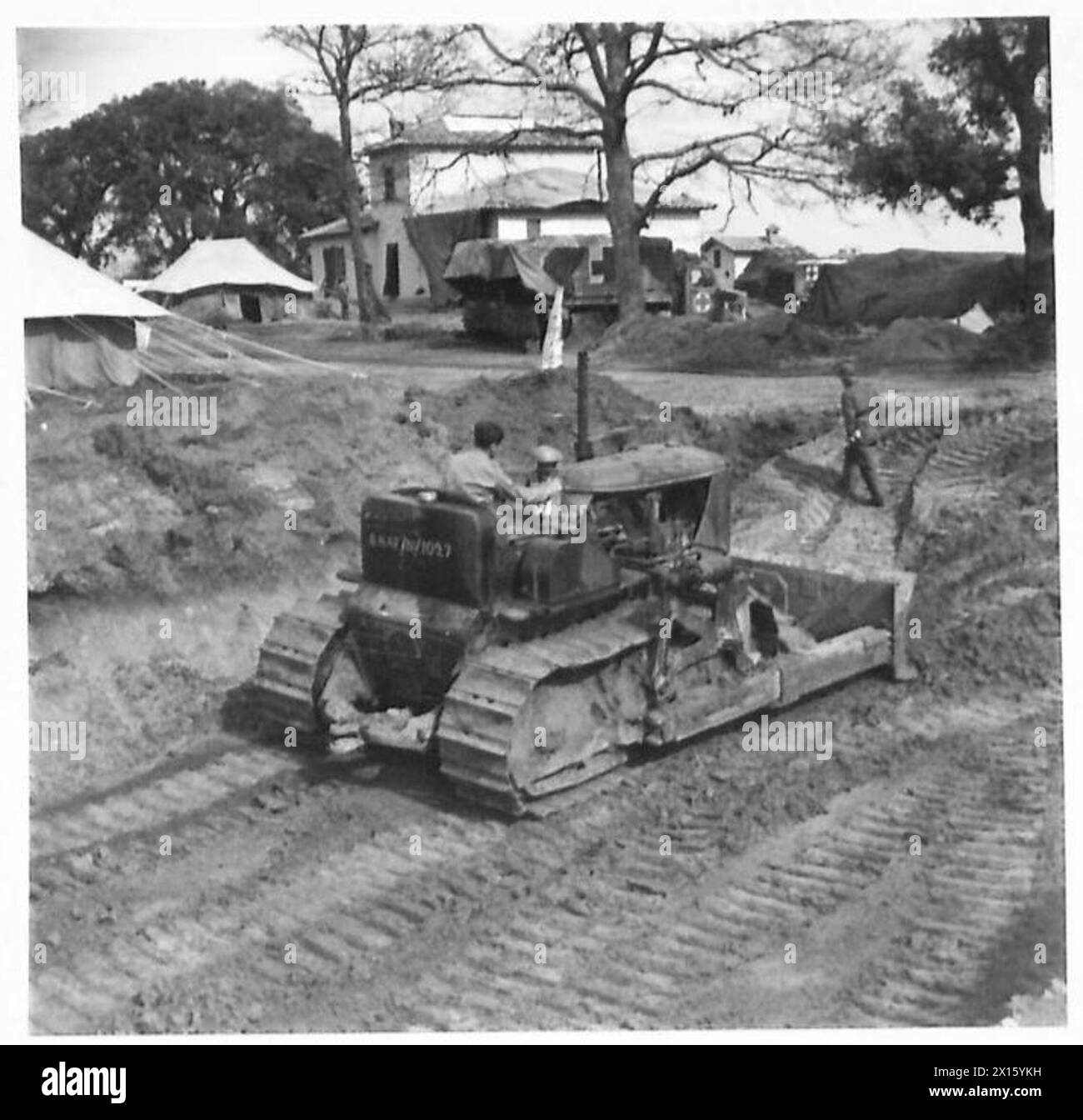 A Caterpillar D7 bulldozer is used at the Anzio bridgehead to excavate ...