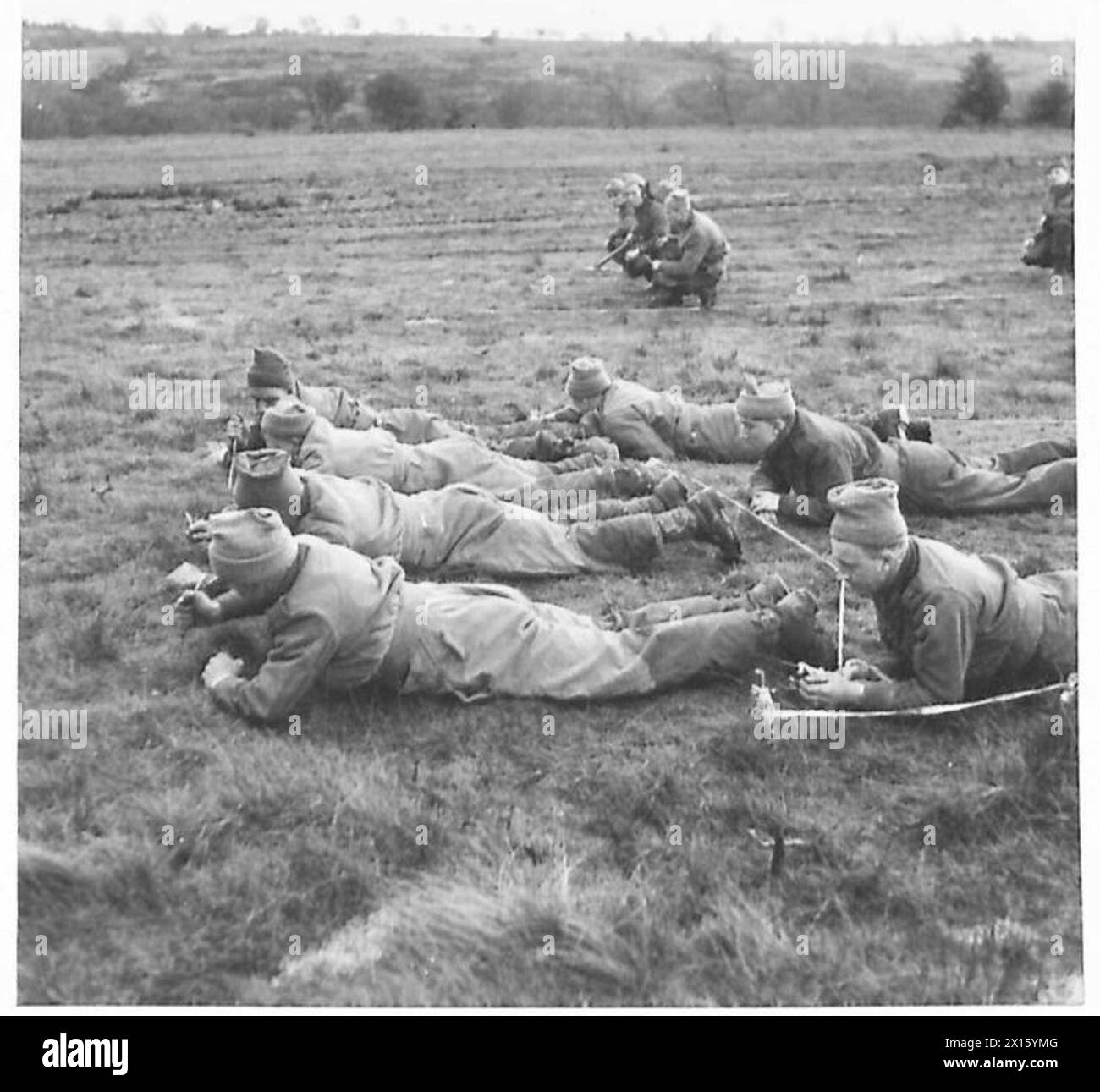 MINE CLEARANCE DRILL DEMONSTRATION - Sappers are using a prodding ...