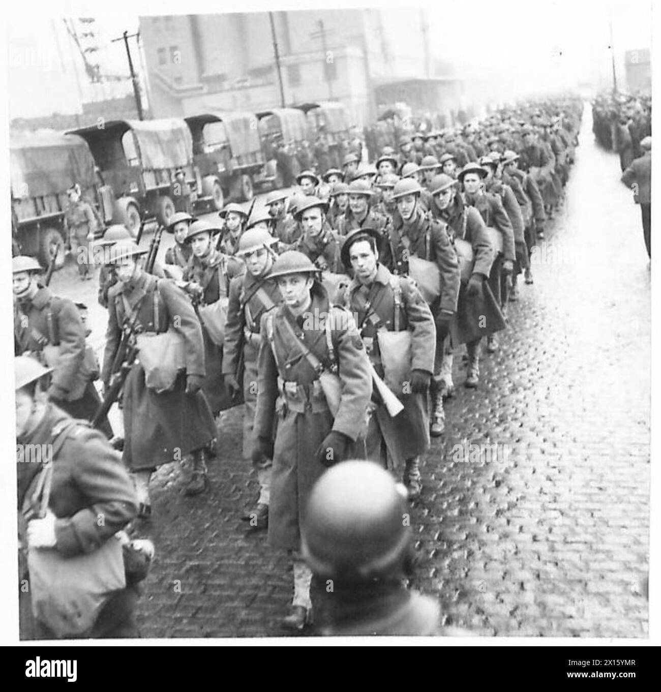UNITED STATES TROOPS LAND IN ULSTER - The men march along quayside to ...
