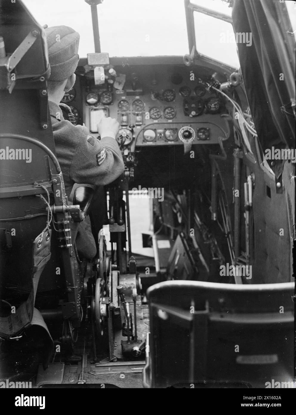 ROYAL AIR FORCE BOMBER COMMAND, 1939-1941. - A sergeant at the controls of an Armstrong ...
