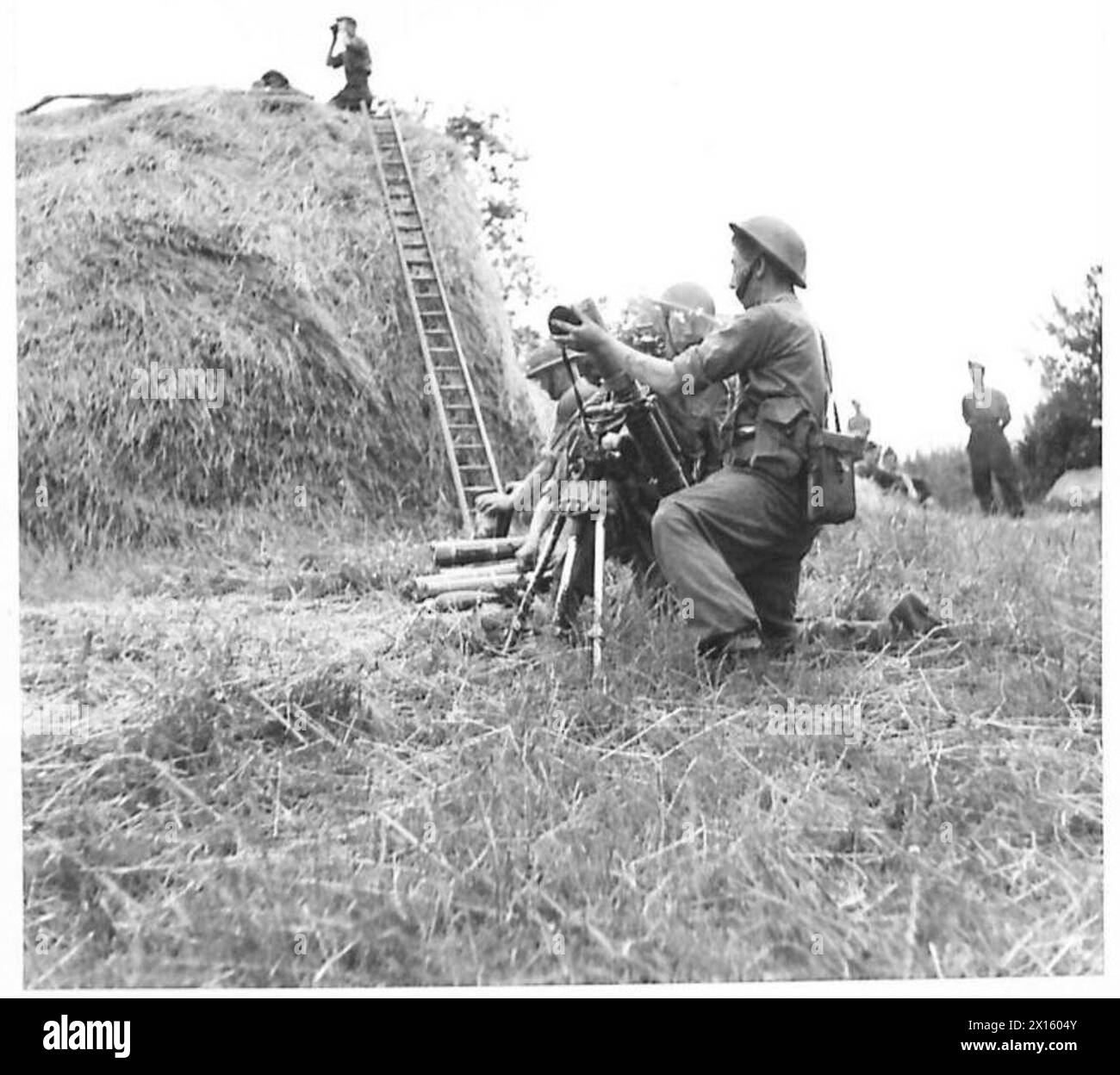 BATTLE SCHOOL EXERCISE - 3-inch mortar section in action while a stack ...
