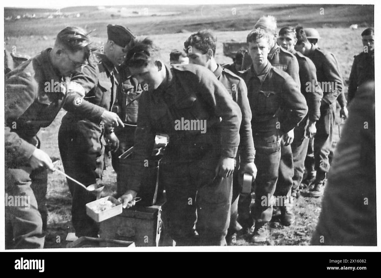 British and Canadian troops have lunch after a training session near ...