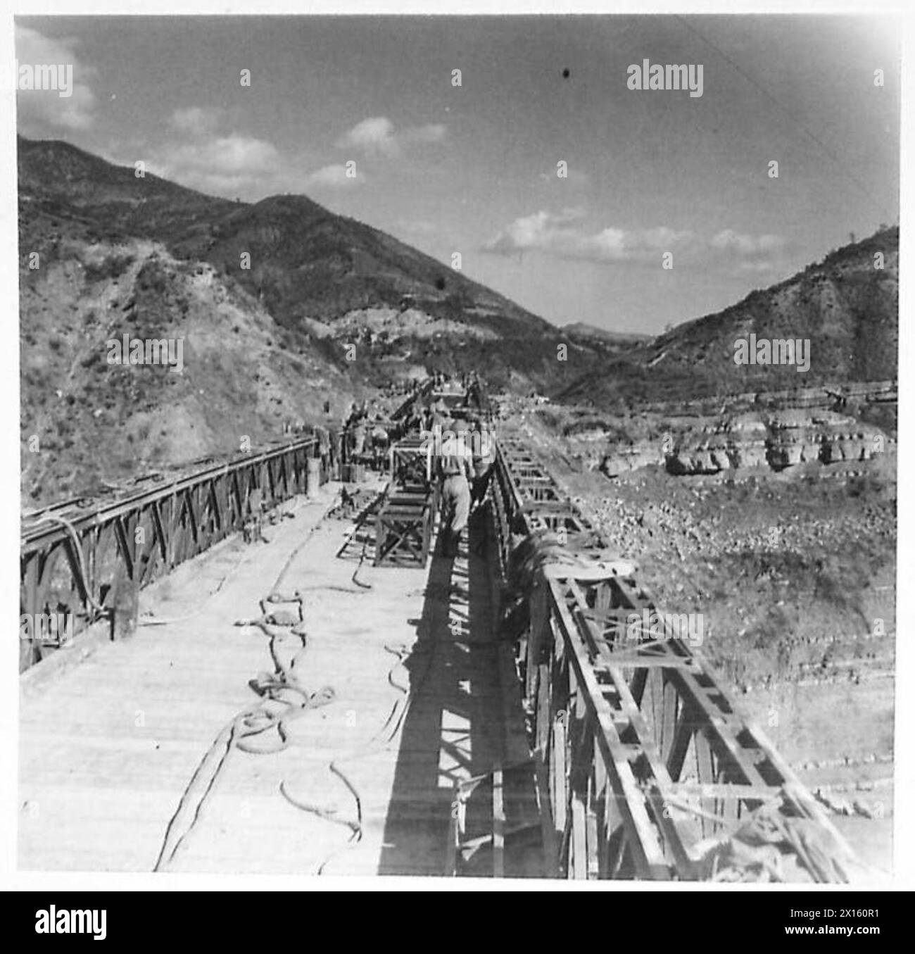 FIFTH ARMY : VARIOUS - A Bailey bridge under construction across the ...