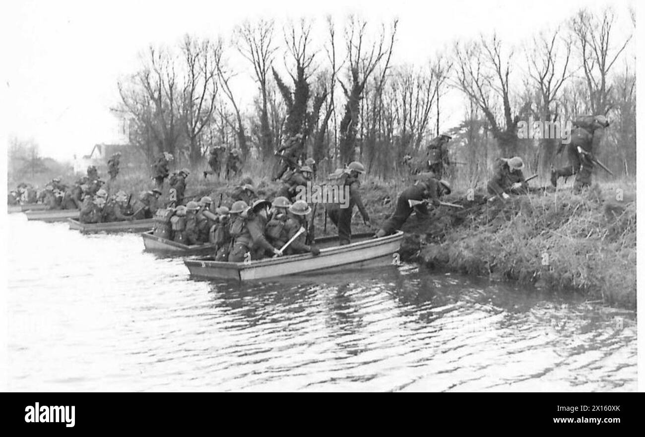 Troops safely cross a river, scramble up the far bank, and advance to ...