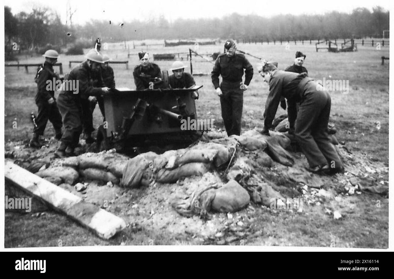CANADIANS - Anti-tank gun going into action British Army Stock Photo ...