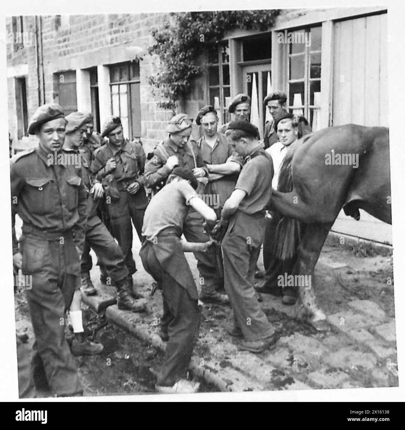 THE LIBERATION ARMY - Troops giving the village blacksmith a helping ...