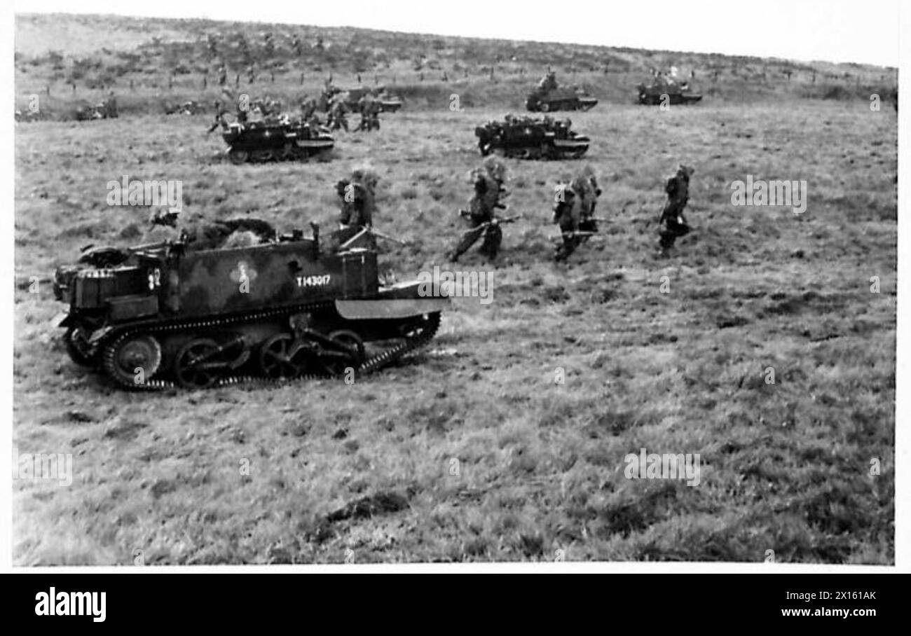 SMOKE SCREEN DEMONSTRATION - Bren carriers and troops moving forward ...