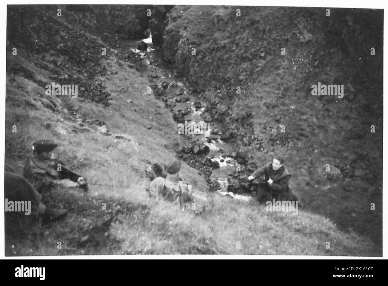BRITISH AND CANADIAN TROOPS IN ICELAND - Signallers laying cables over ...