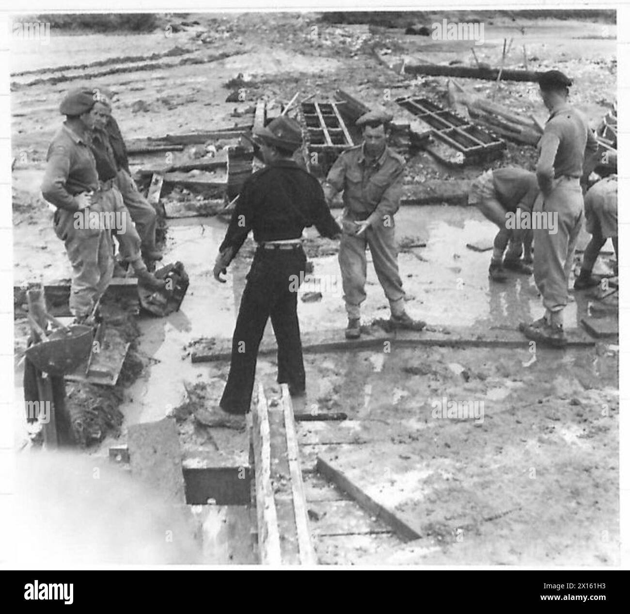 Italian Pioneers with the Eighth Army reconstruct the foundations of a ...