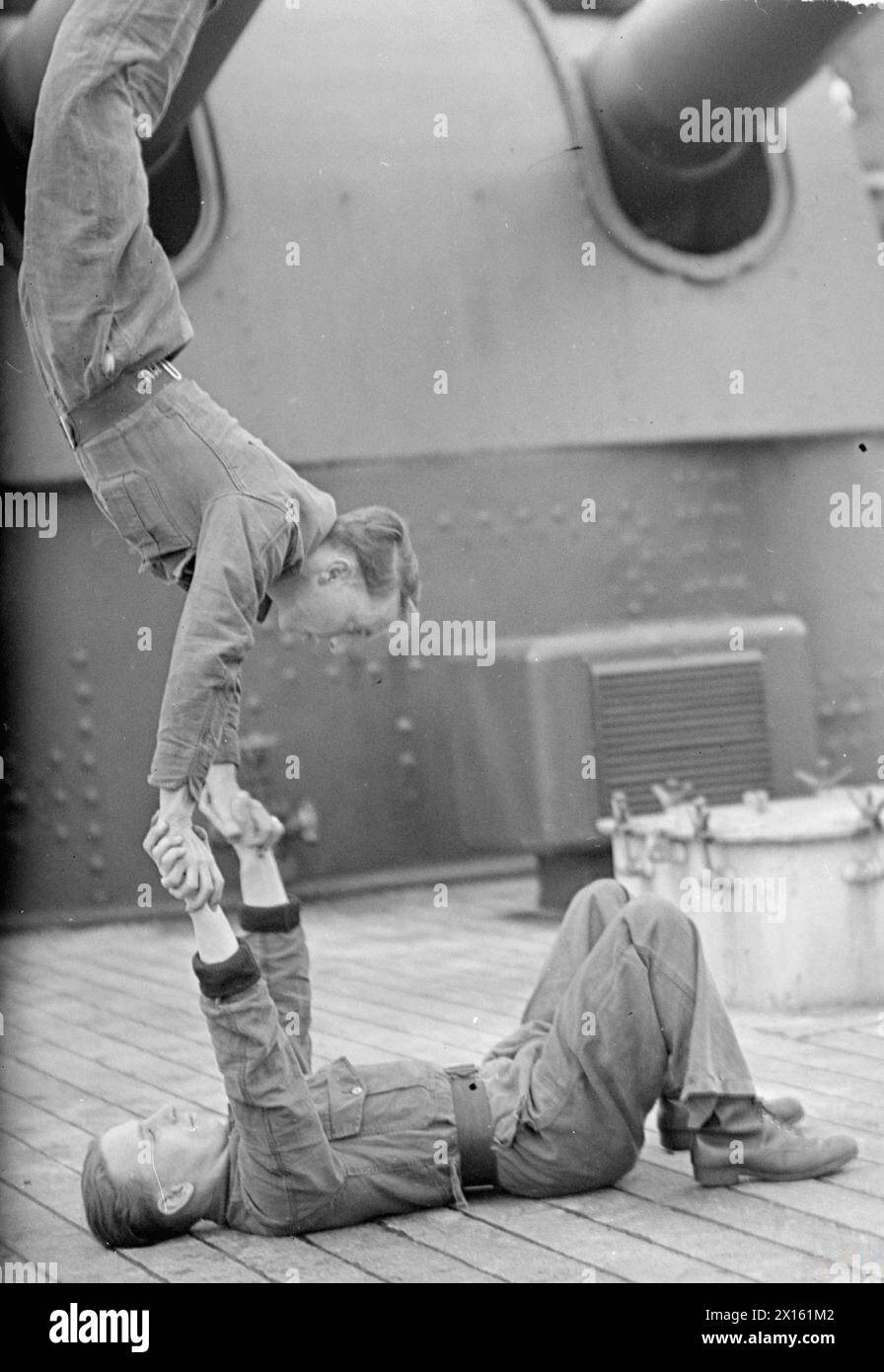 HMS LONDON'S TWIN ACROBATS. 5 JANUARY 1943, ROSYTH. ALF AND FRED COOPER ...