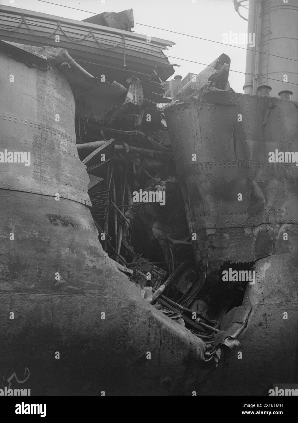 DAMAGE TO HMS WALLACE. 2 MAY 1942, BLACKWALL. - Views showing the ...