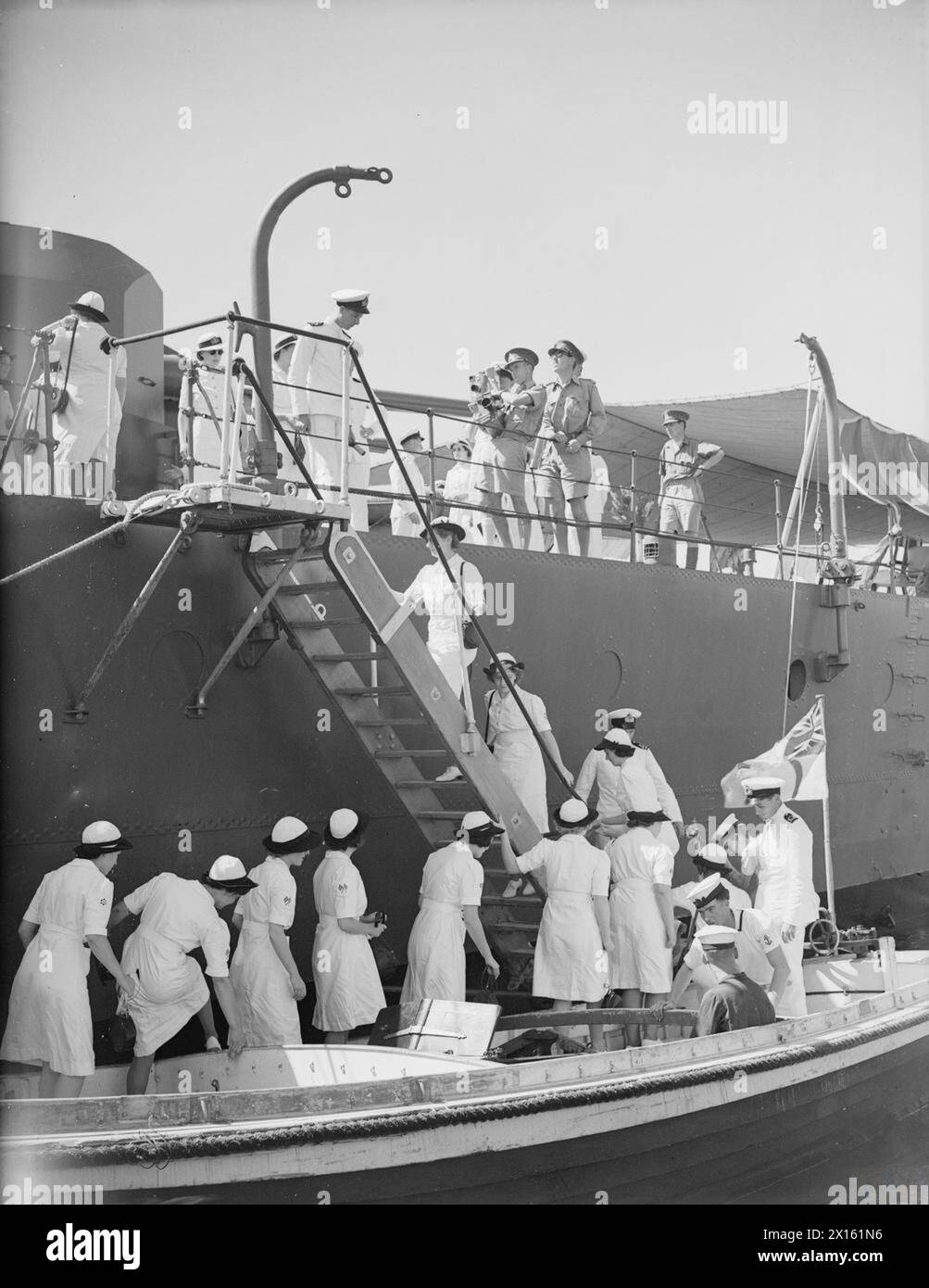 WRNS VISIT THE CRUISER HMS EURYALUS OF THE MEDITERRANEAN FLEET. 3 MAY 1942, ALEXANDRIA. - Some ...