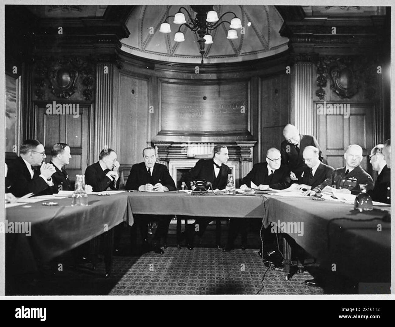 SIR ARCHIBALD SINCLAIR SIGNS THE EXTENSION OF THE EMPIRE AIR TRAINING ...