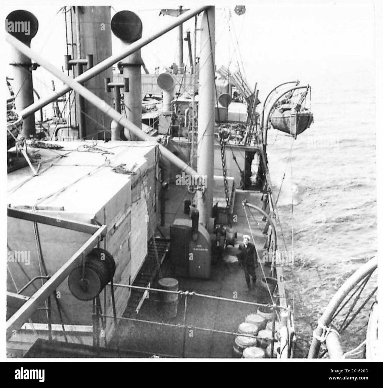 ON BOARD AN AFRICAN BOUND SHIP IN CONVOY - Deck scene. As much as ...