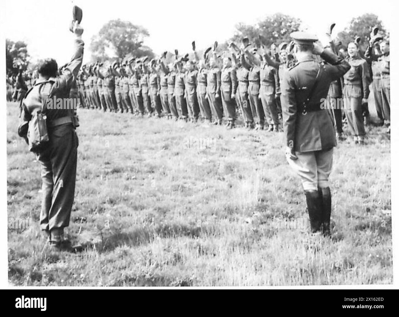 Soldiers of a Light Anti-Aircraft Regiment cheer the King during his ...