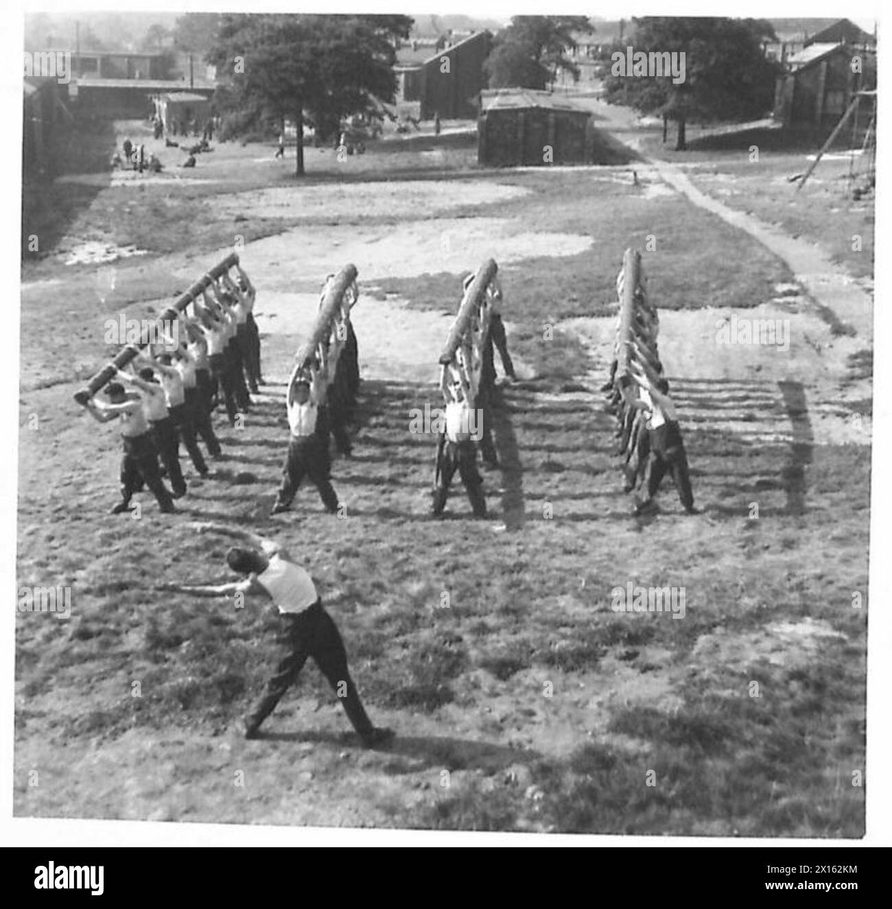 PARACHUTE TRAINING DEPOT & SCHOOL AIRBORNE FORCES - Log drill by men ...