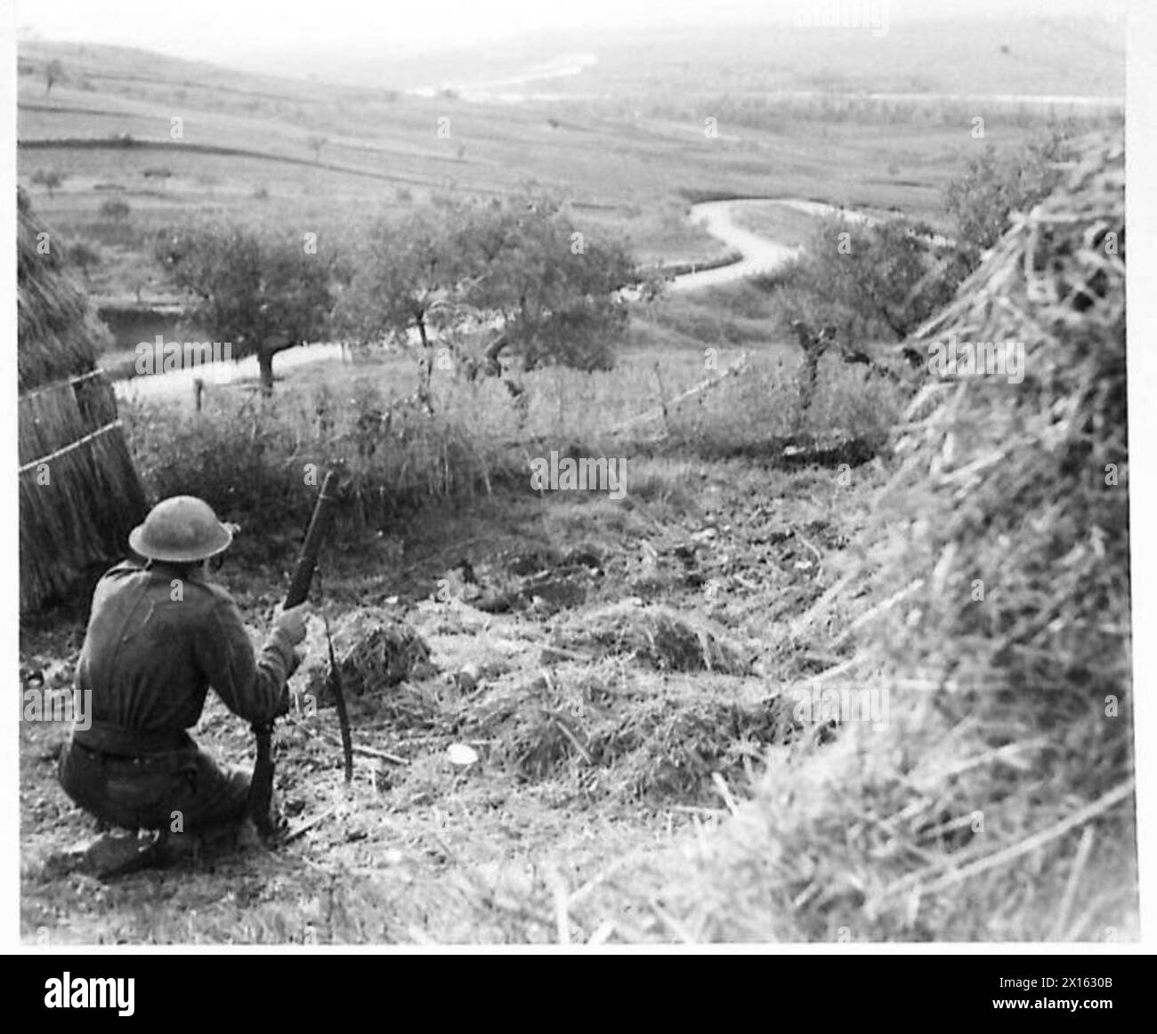 British infantry of the Eighth Army observe enemy positions on the ...