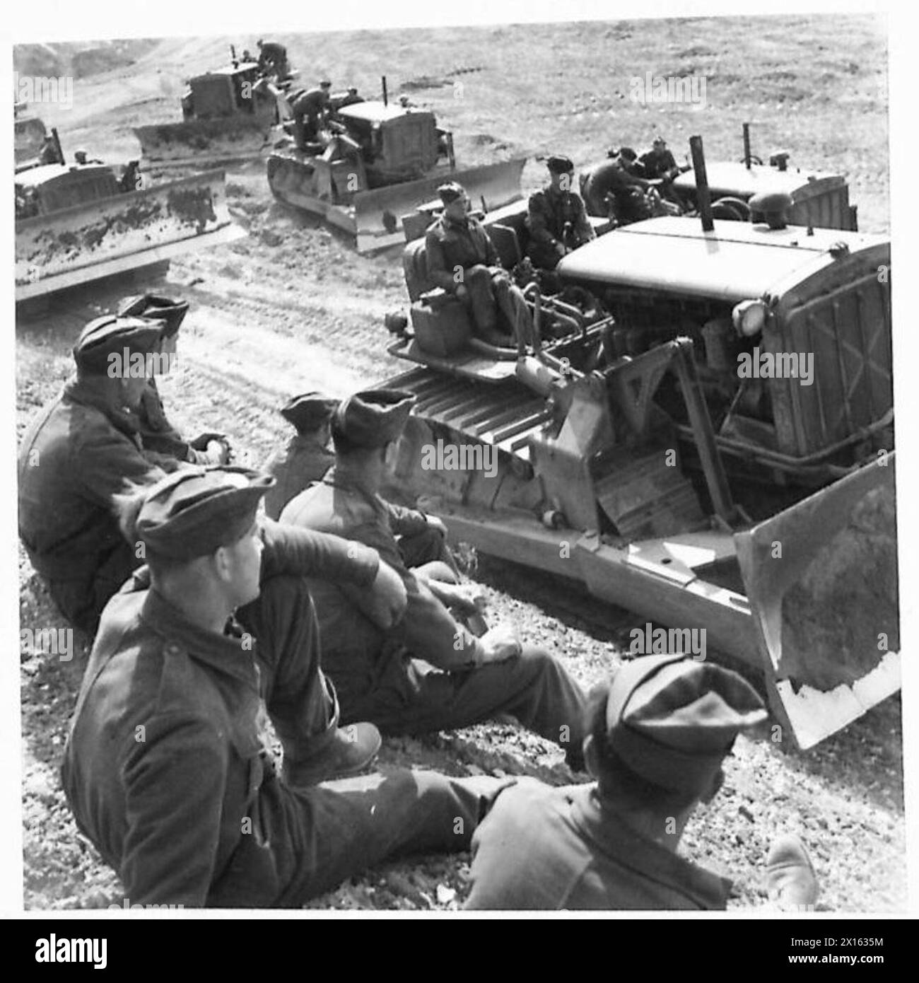 ARMY MOTOR TRACTOR SCHOOL - Bulldozers at work on the training ground ...