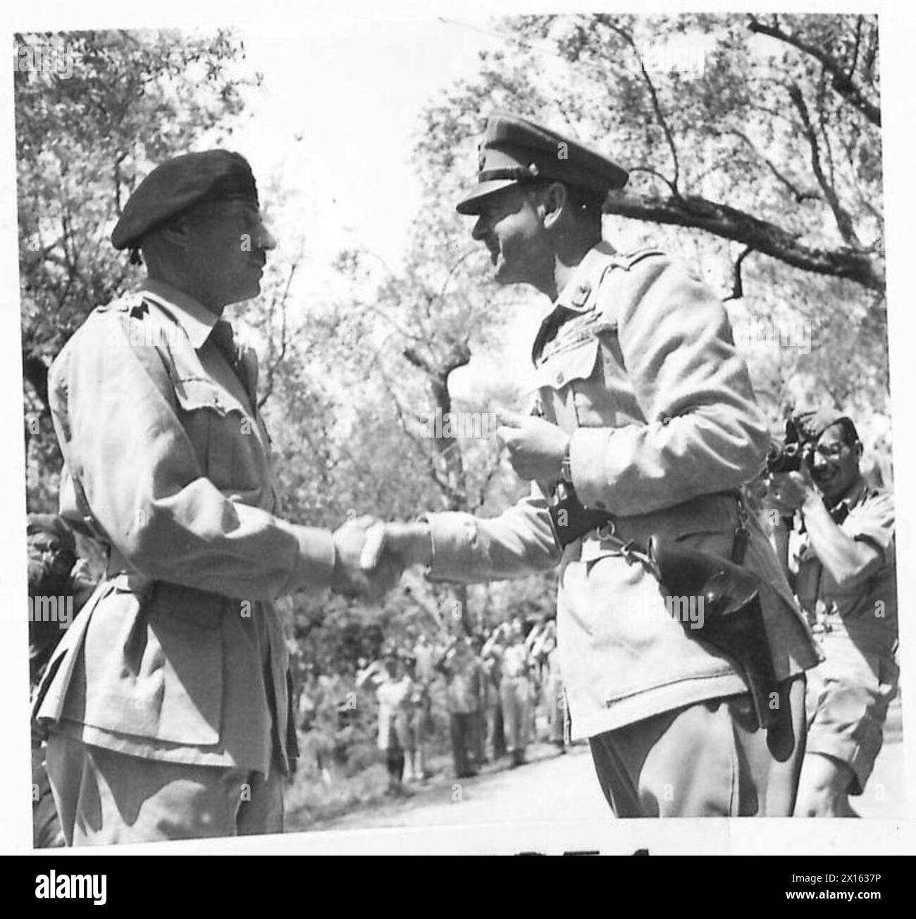 Italian commander handshake hi-res stock photography and images - Alamy
