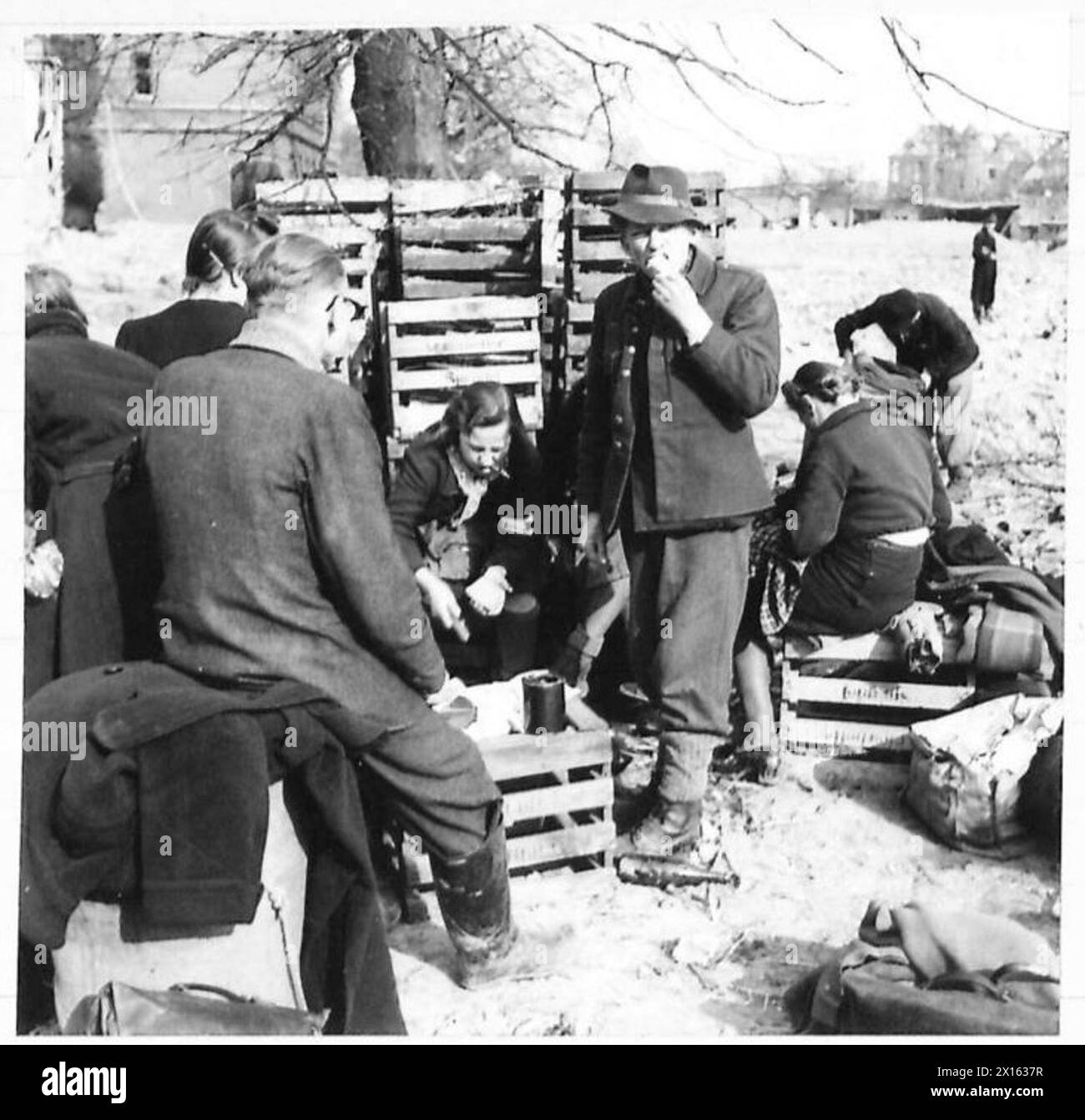 ALLIED MILITARY GOVERNMENT IN GERMANY - Some of the people eating their ...