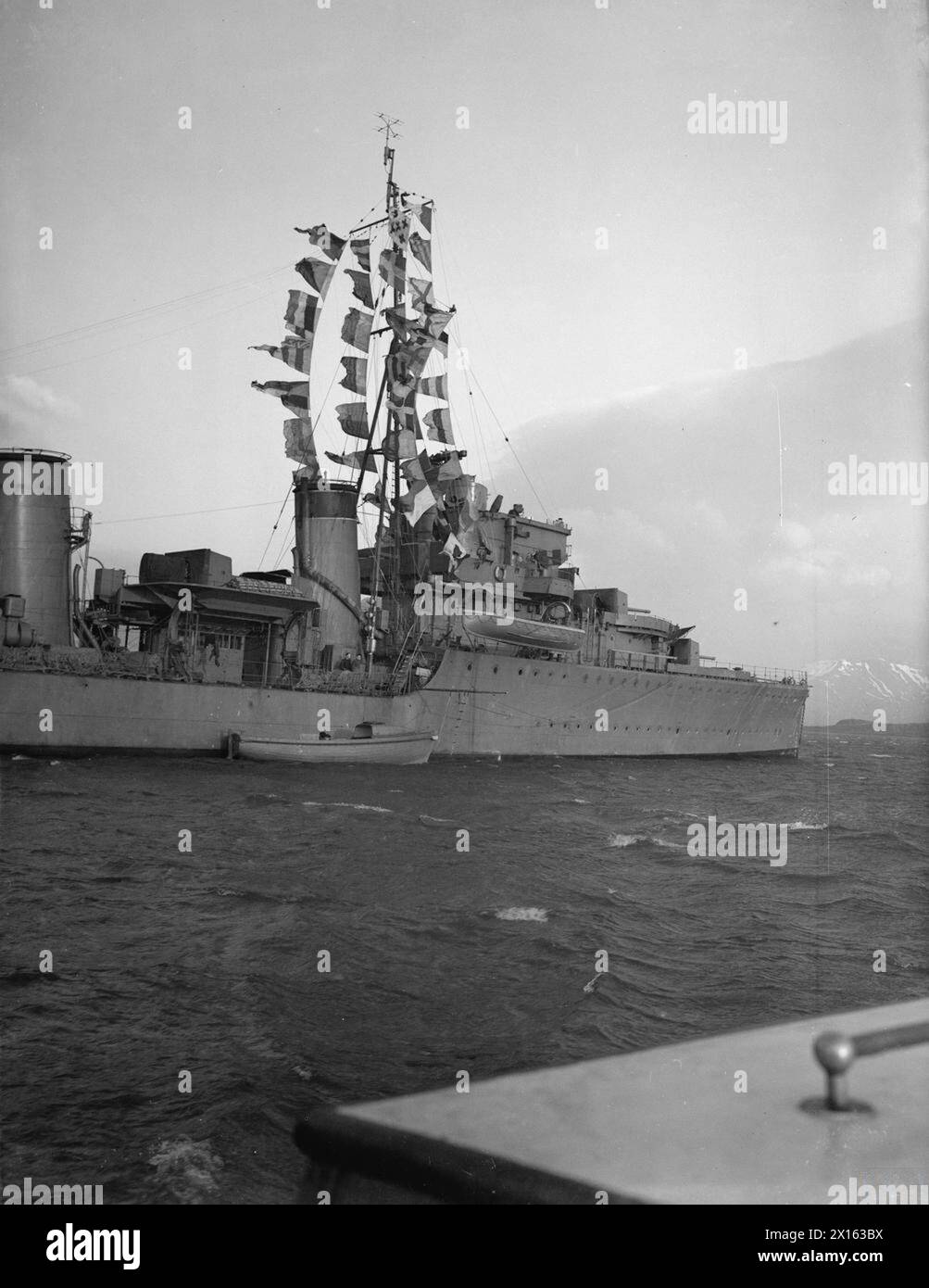 Signal flags on HMS Inglefield are hoisted to dry after heavy rain ...