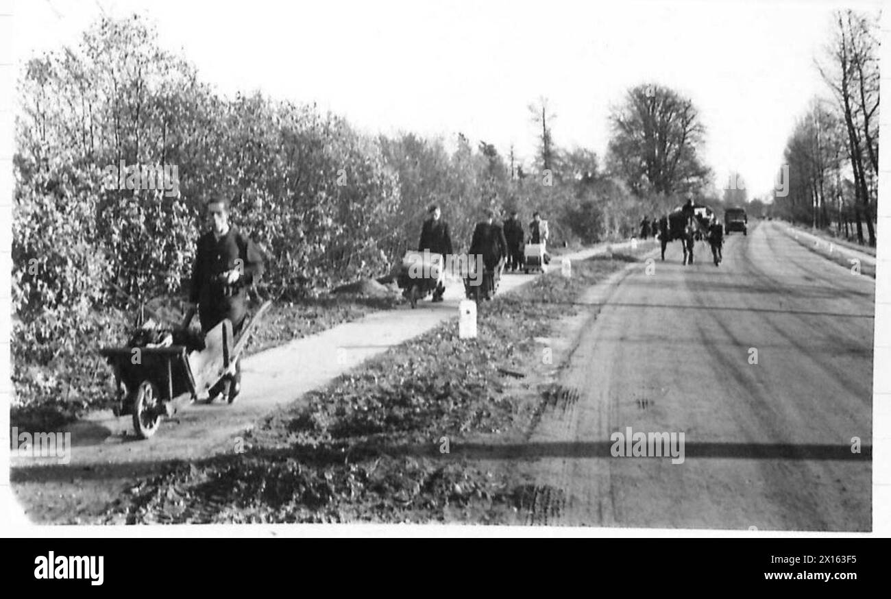 Villagers leave Horn, near Roemond, during German shelling and evacuate ...
