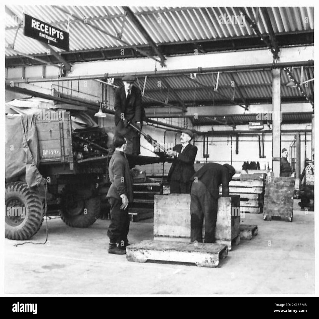 Logistics warehouse management team Black and White Stock Photos ...