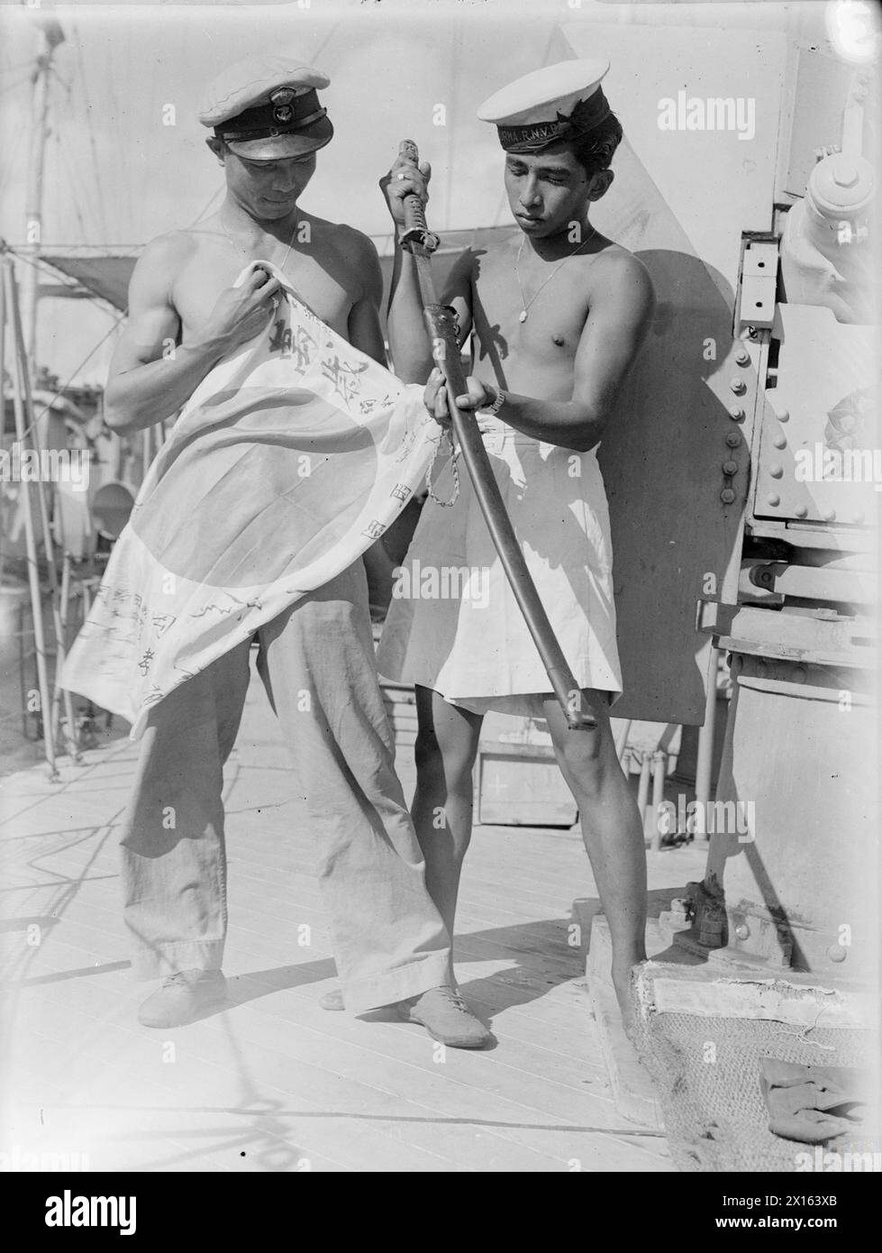 On 8 April 1945 in Colombo, officers and men of a Burma RNVR motor ...