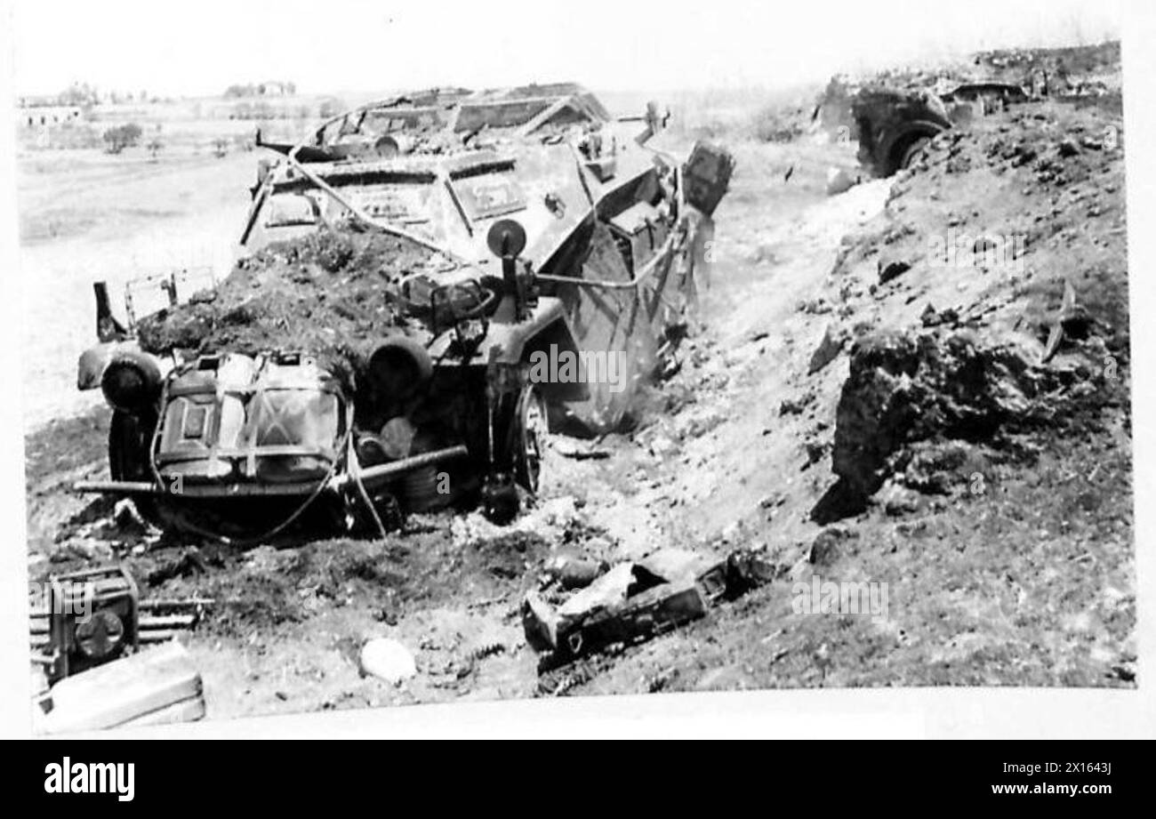 INVASION OF SICILY - A German armounred car knocked out by barrage ...