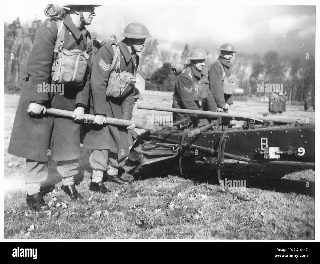 THE GUNNERS TRAIN FOR SPEED - Manhandling a 6" Howitzer into position ...