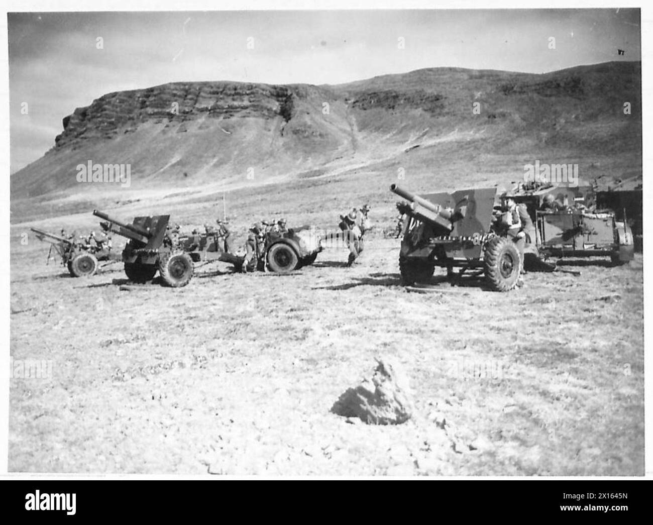 25-pounder field guns of the 386th Field Battery, R.A., 143rd Regiment, positioned at Alafoss ...