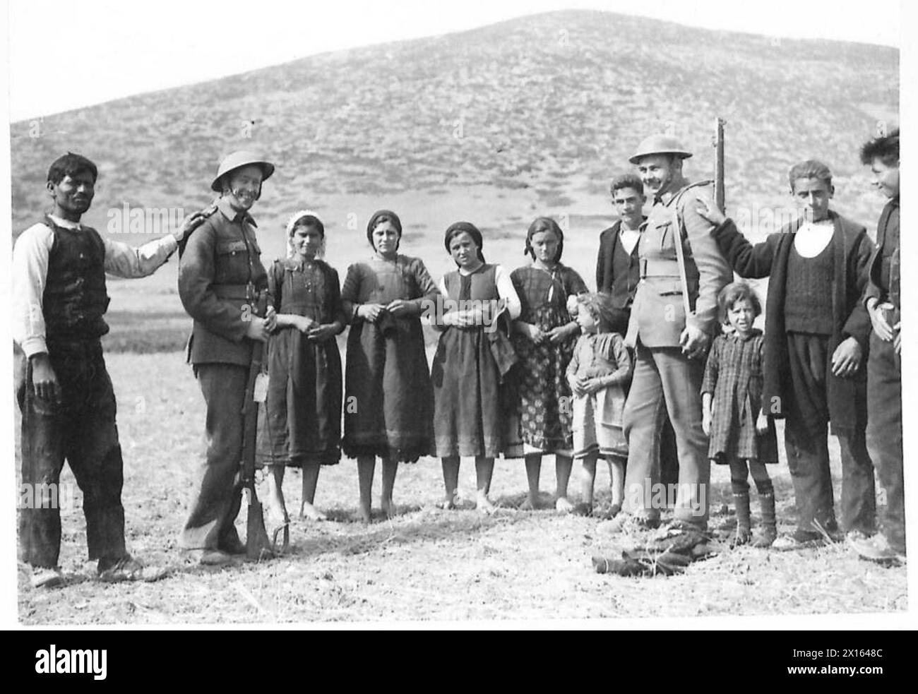 PHOTOGRAPHS TAKEN OF BRITISH TROOPS IN GREECE - Greek inhabitants of a ...