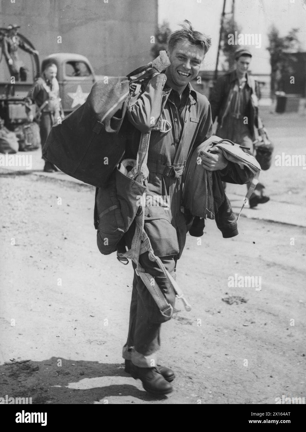 Captain William H. Arthur of the 91st Bomb Group returns from a ...