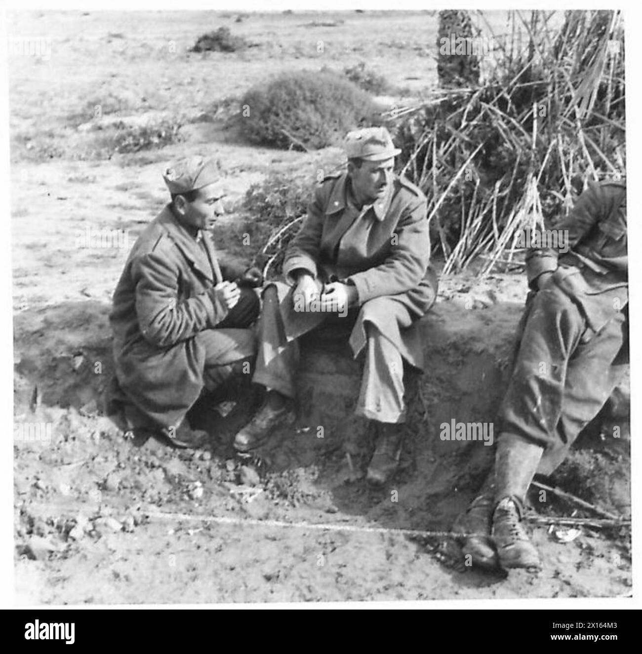 Italian prisoners are held on the roadside after the first night of the ...