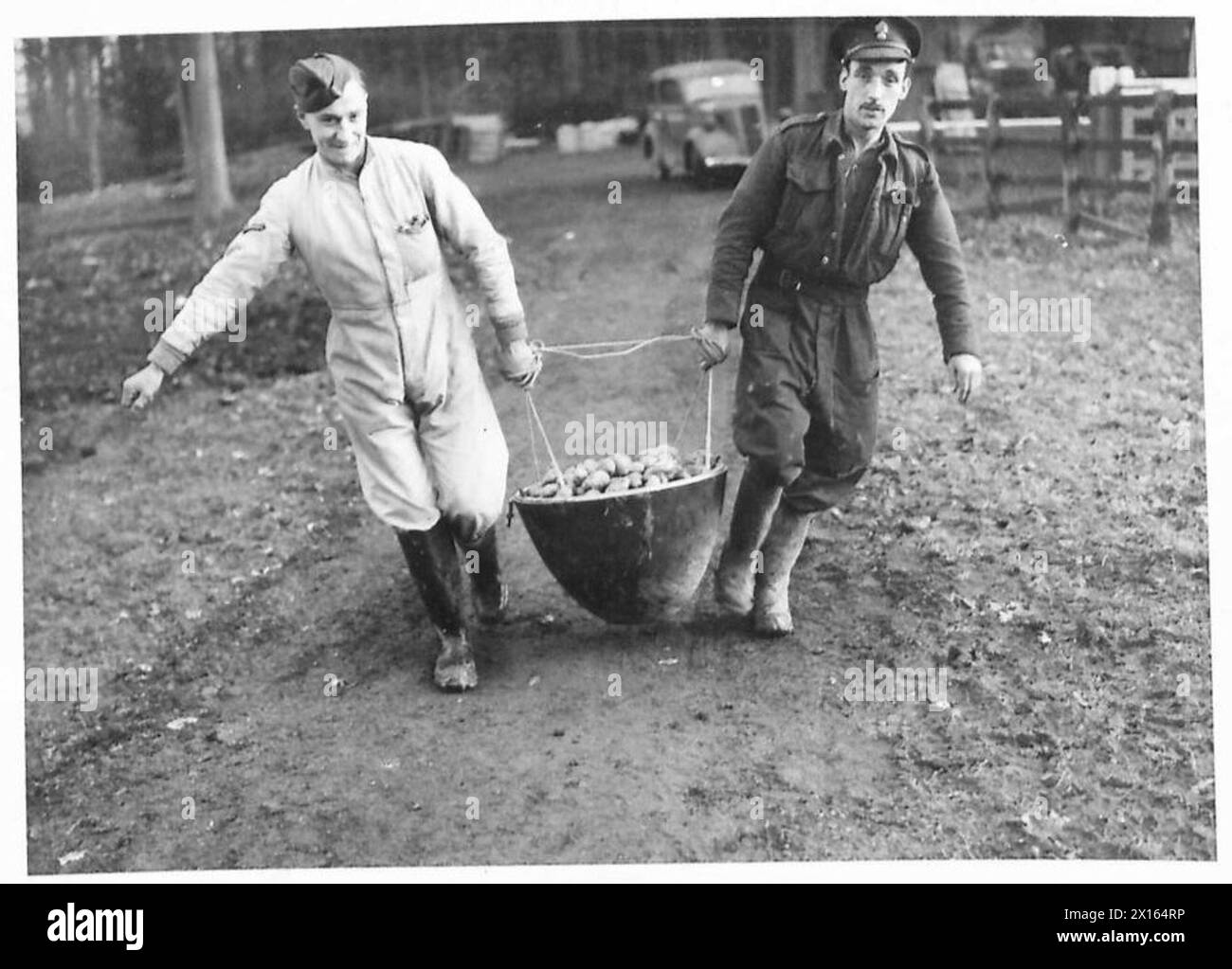 DUDS FOR SPUDS - A portion of a German parachute mine container being ...