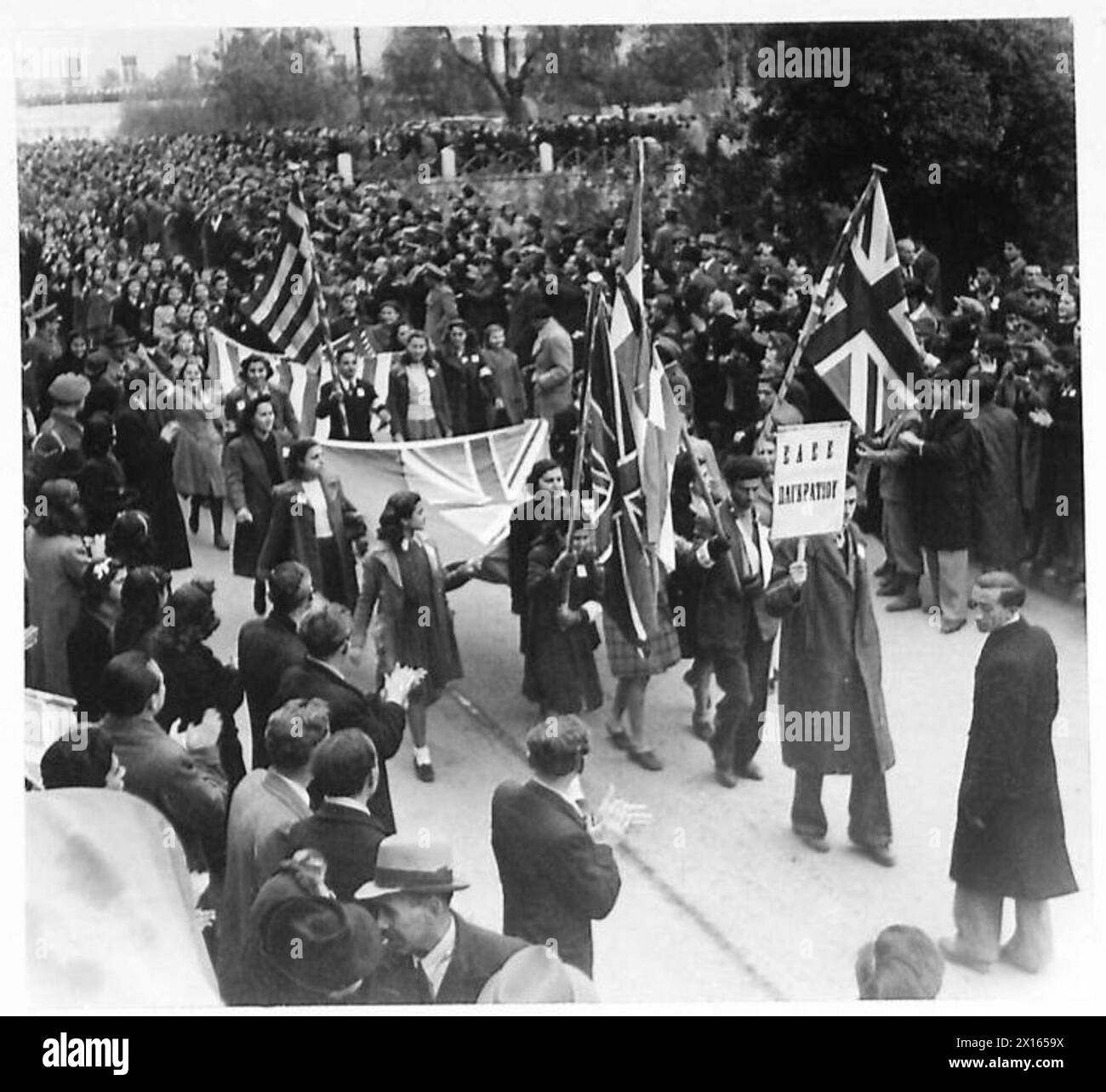 A procession passes through city streets en route to Constitution ...