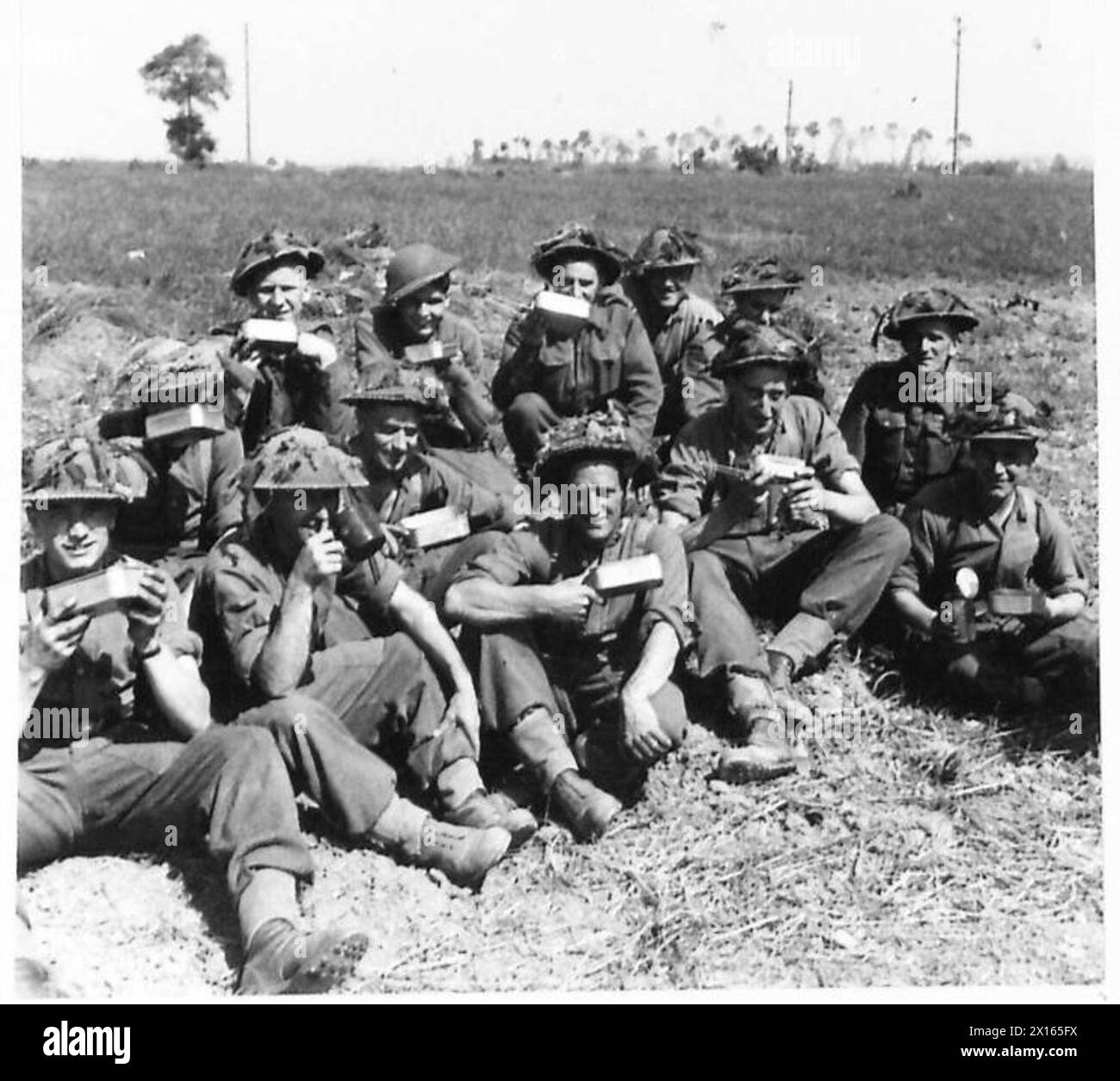 NORMANDY - VARIOUS - Some of the troops enjoying a break for tea ...