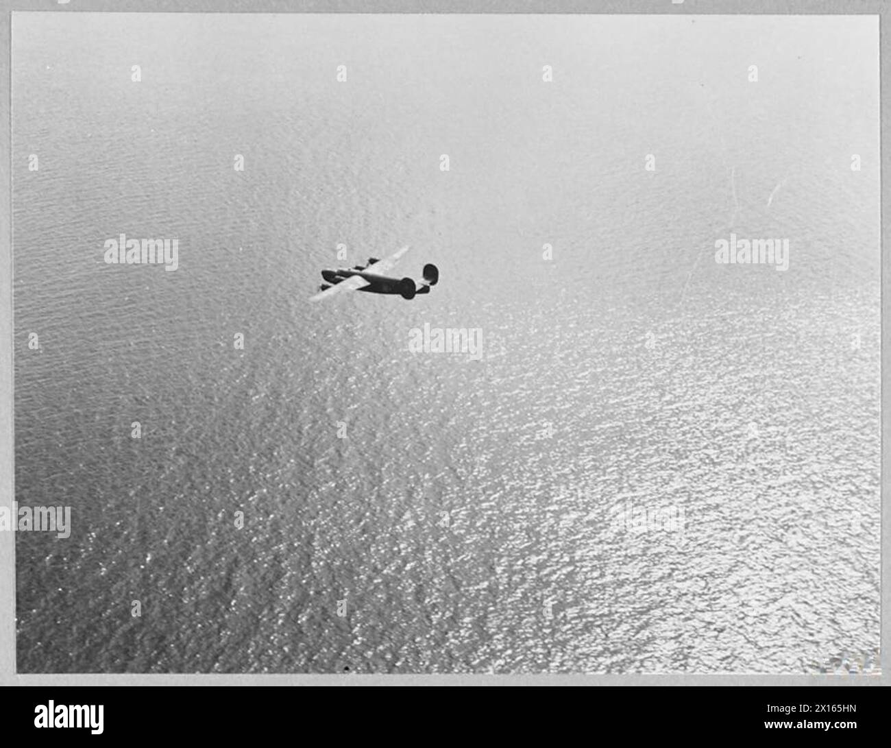 A B.O.A.C. Liberator approaches the coast of Scotland after flying ...