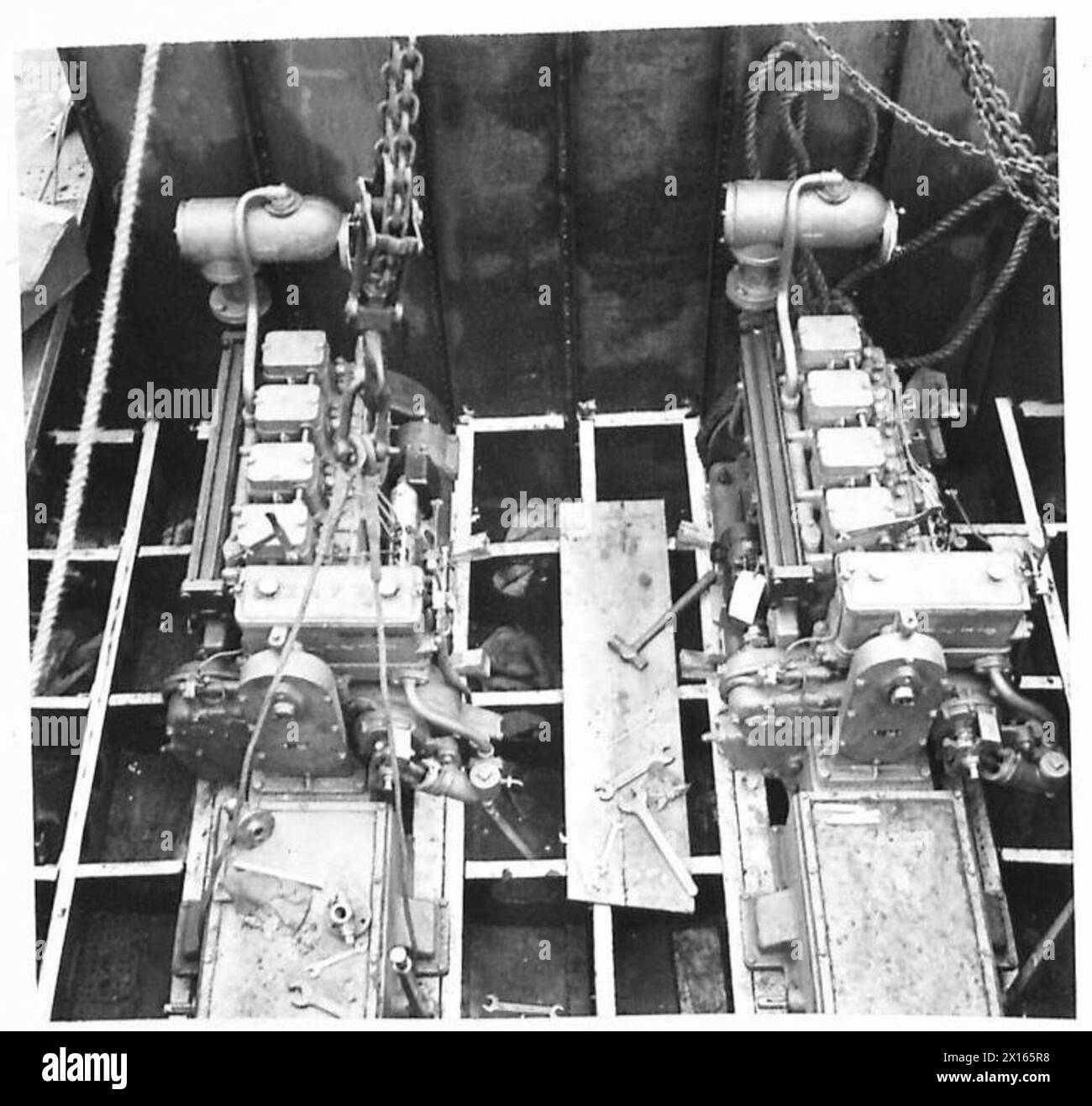 Royal Engineers assemble a 50-foot twin screw tug, shown from a head-on ...