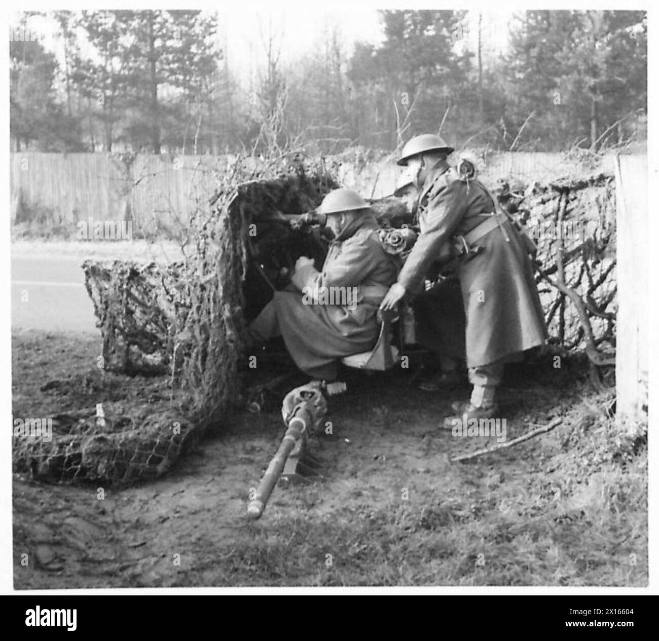 ROUNDING UP PARACHUTE TROOPS - Men of anti-tank battery with their ...