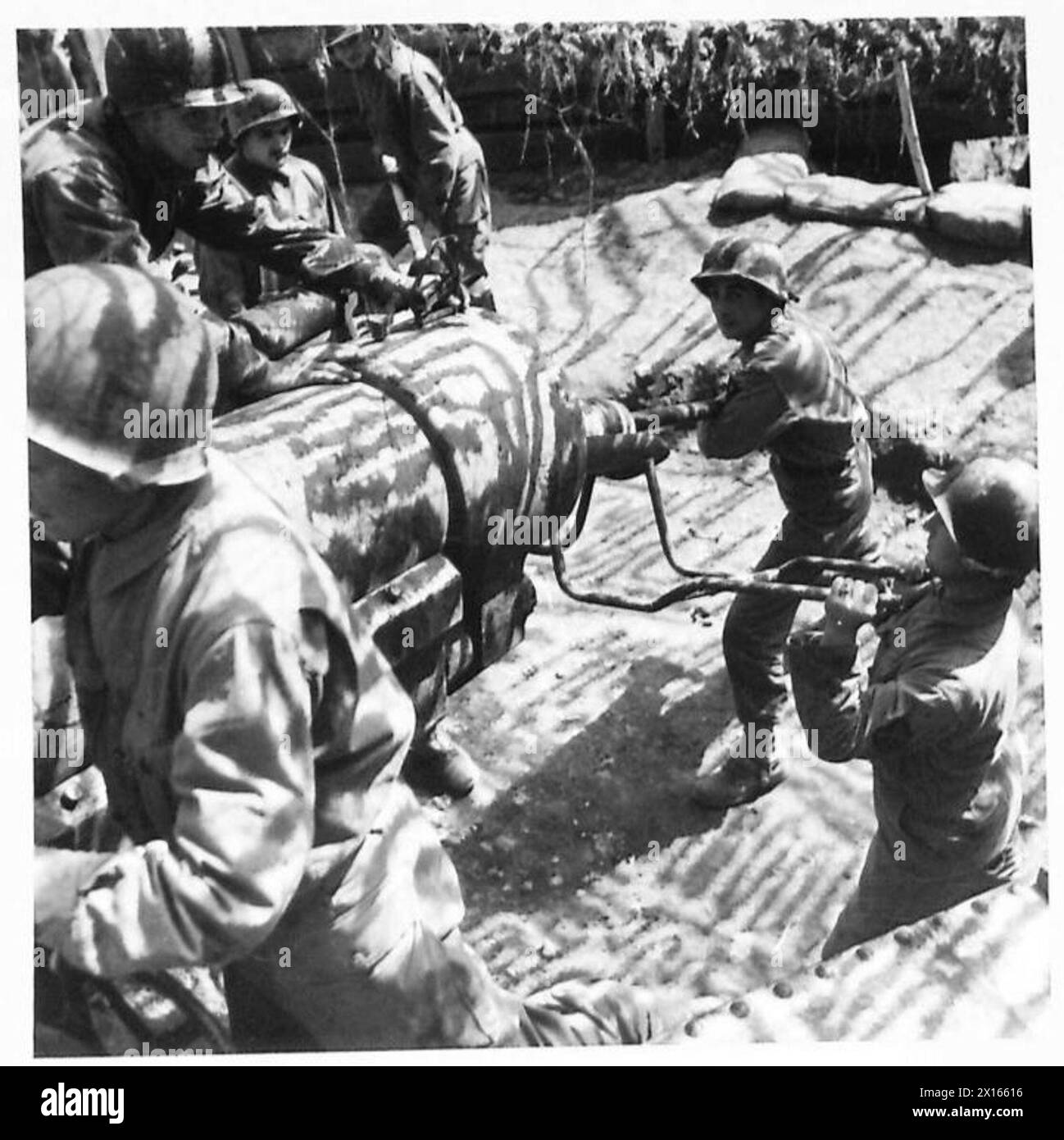 Naval gunners of the Fifth Army's French sector load and operate ...