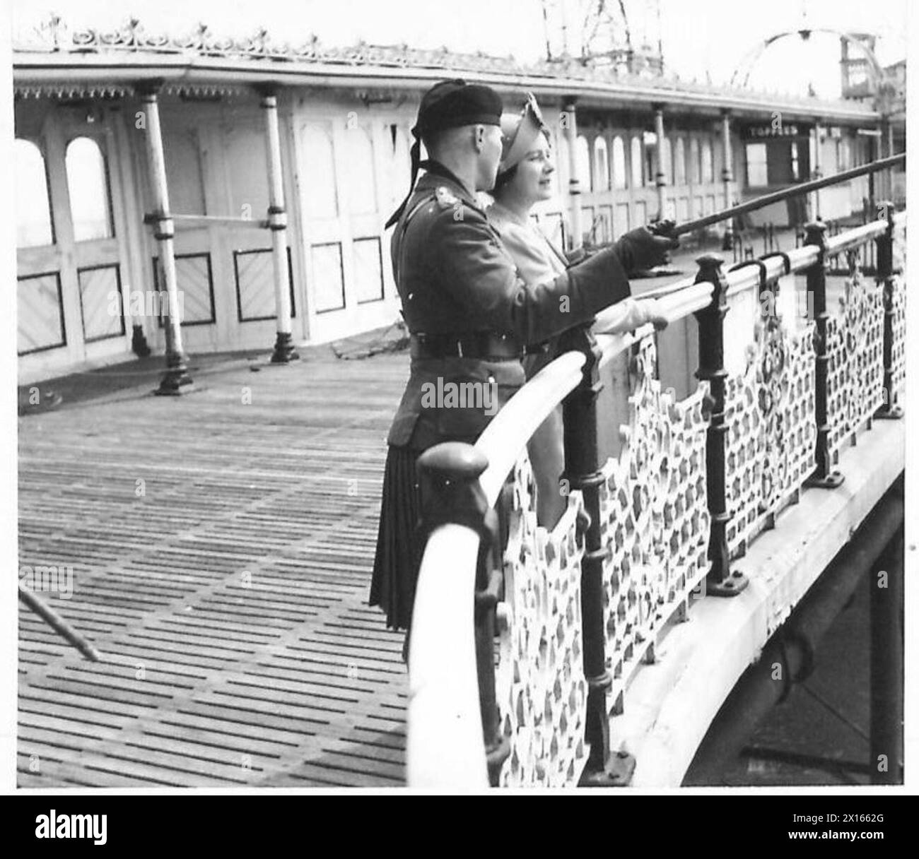 During a visit to London Scottish, the Queen is shown coastal defenses ...