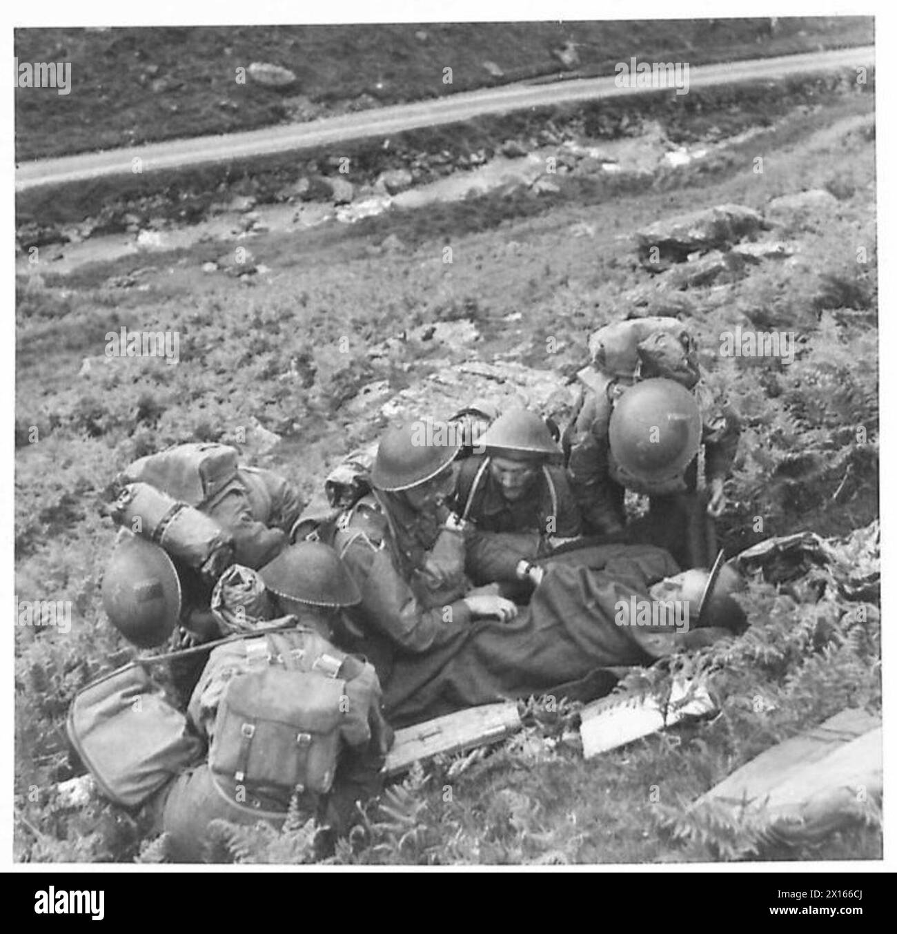 ROYAL ARMY MEDICAL CORPS EXERCISE - On a mountain side during the ...