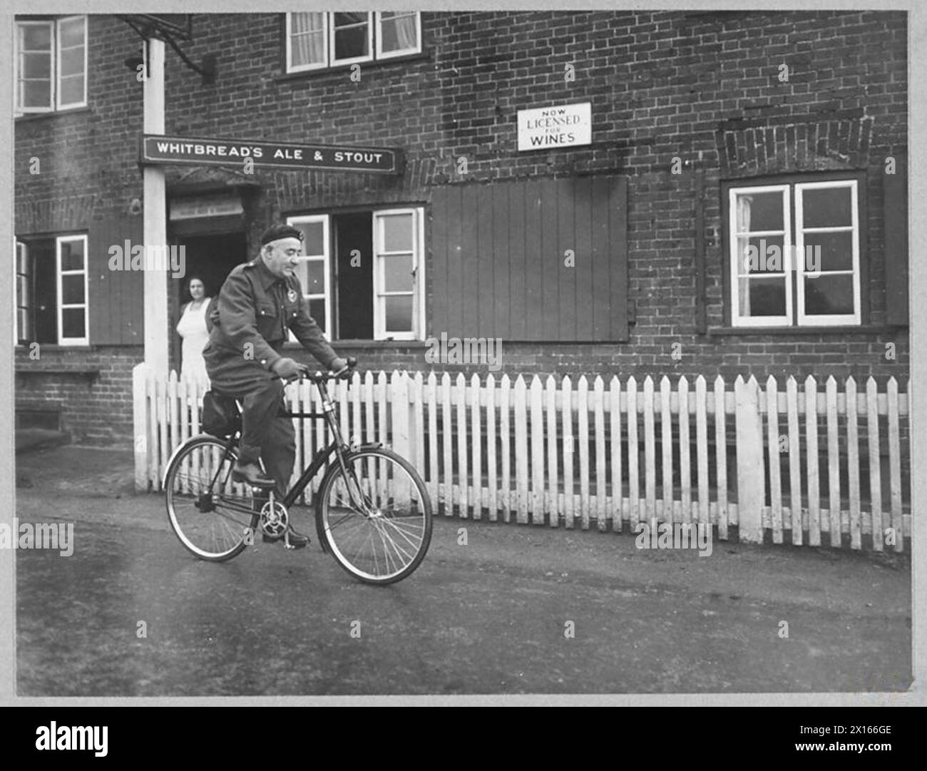 In 1943, a Royal Observer Corps member is shown cycling to his ...