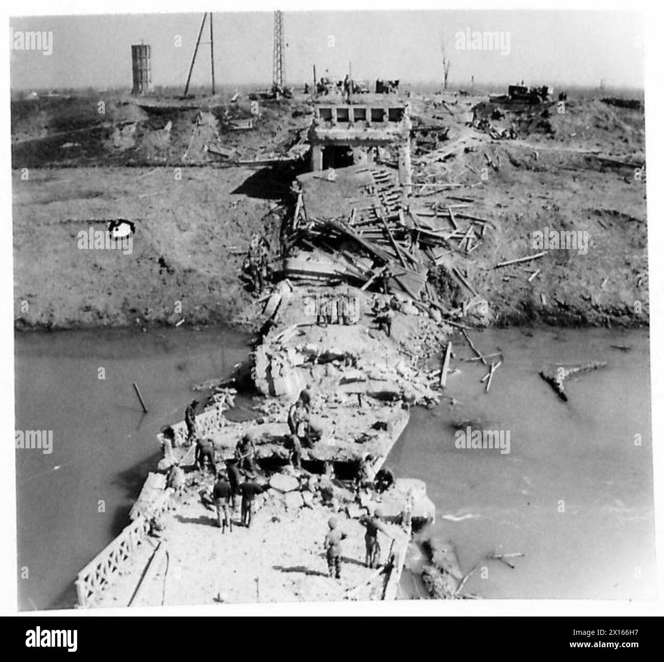 EIGHTH ARMY : FALL OF ARGENTA - Sappers at work on the road bridge over ...
