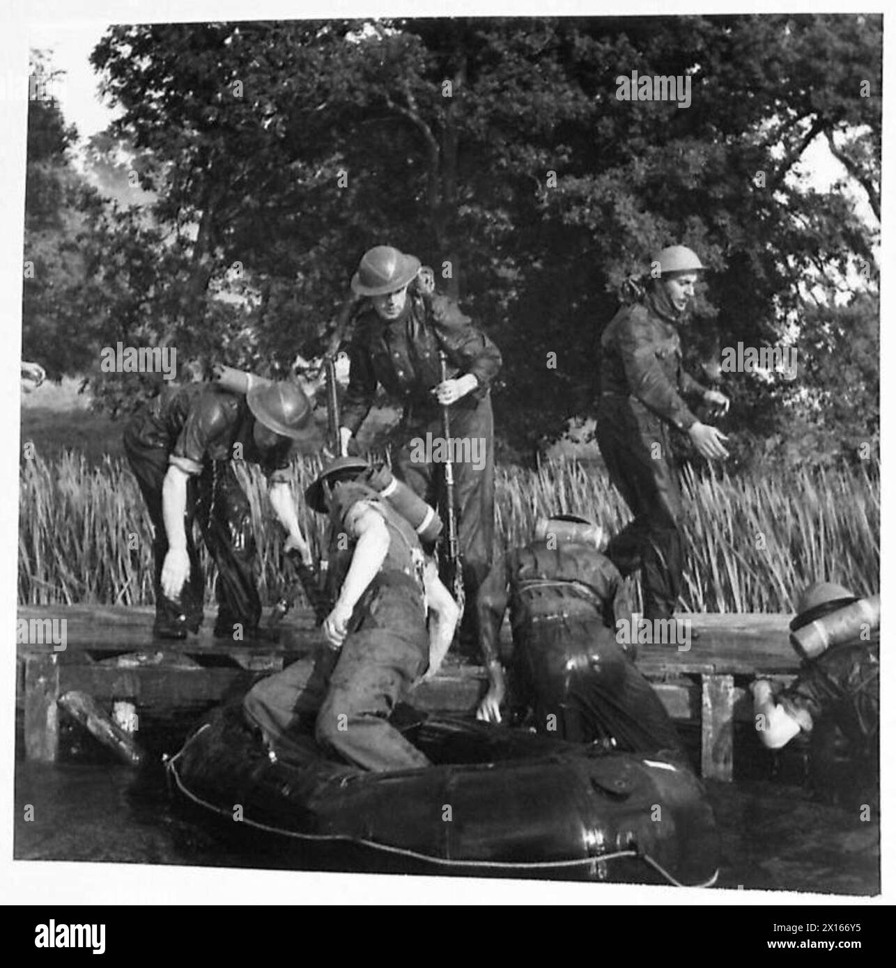 Assisted teamwork Black and White Stock Photos & Images - Alamy