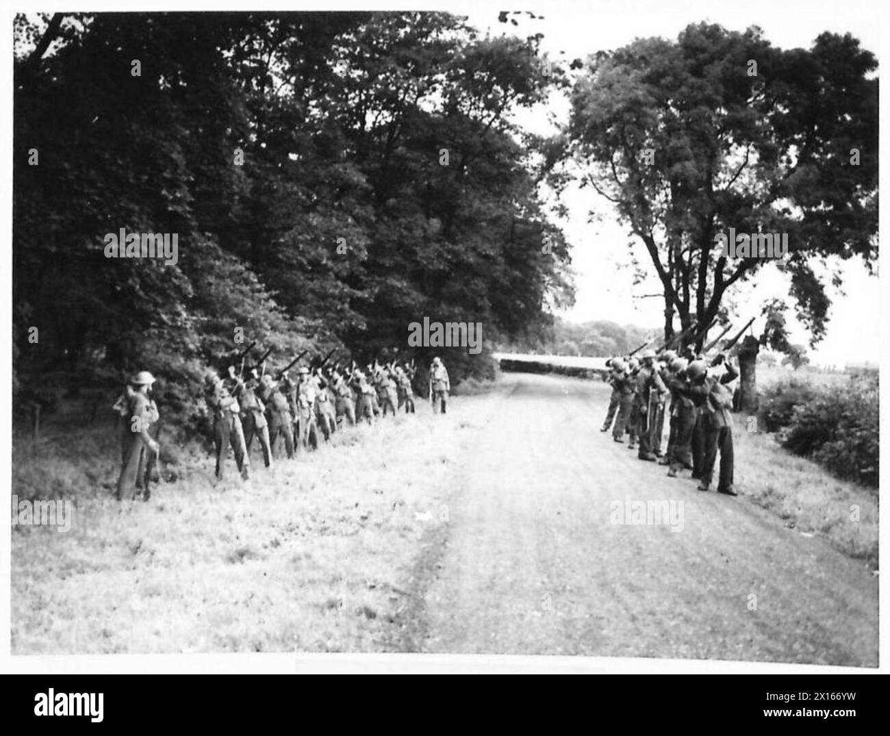 YORK AND LANCASTER REGIMENT IN TRAINING - Some of the men firing a ...
